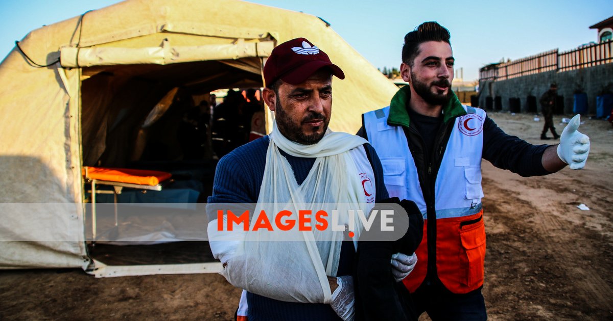 ImagesLive - Palestinian Paramedic Injured In Gaza Clashes